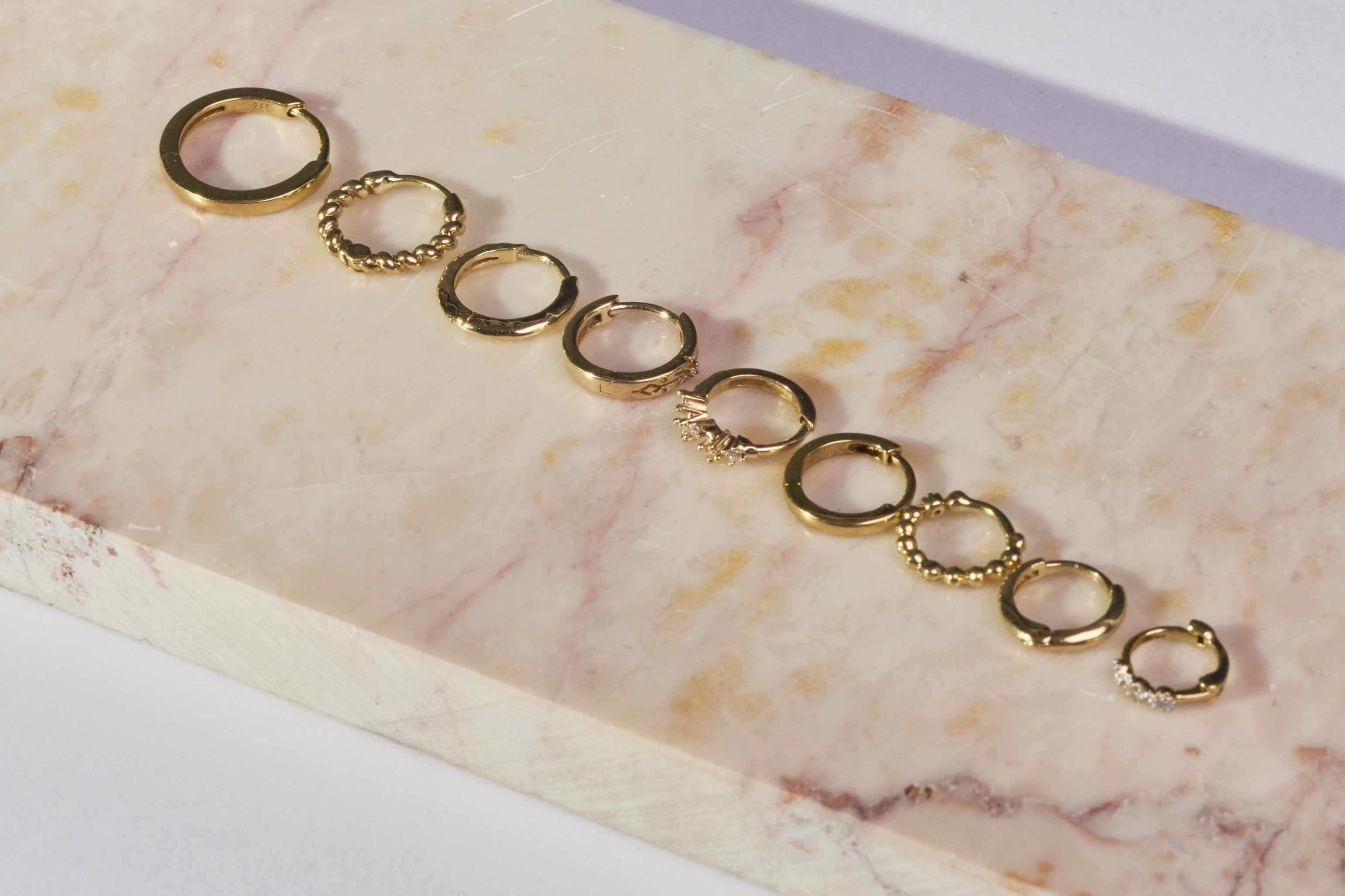 Stacking Made Simple: Why Huggie Hoop Earrings Are a Must-Have – Zohreh ...